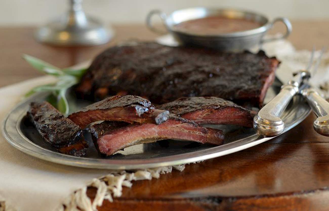 Barbecue Ribs In Pecan Lodge | TasteAtlas | Recommended authentic ...