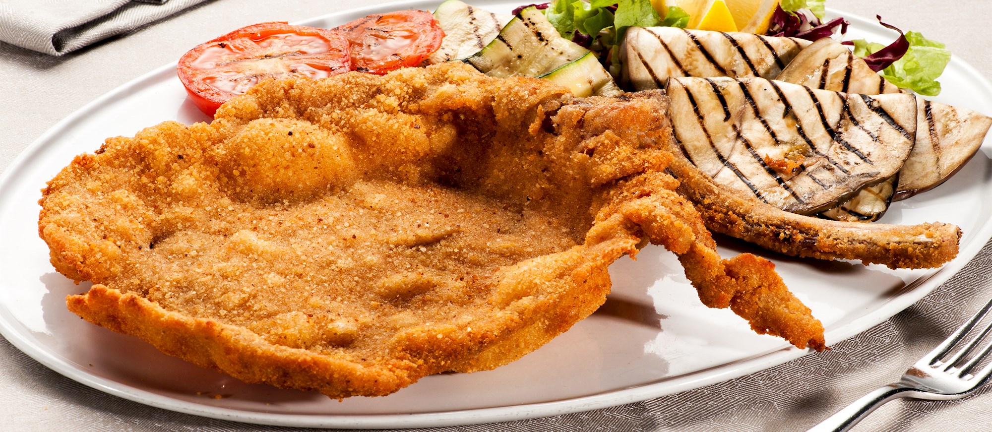Where to Eat the Best Cotoletta Alla Milanese in the World? | TasteAtlas