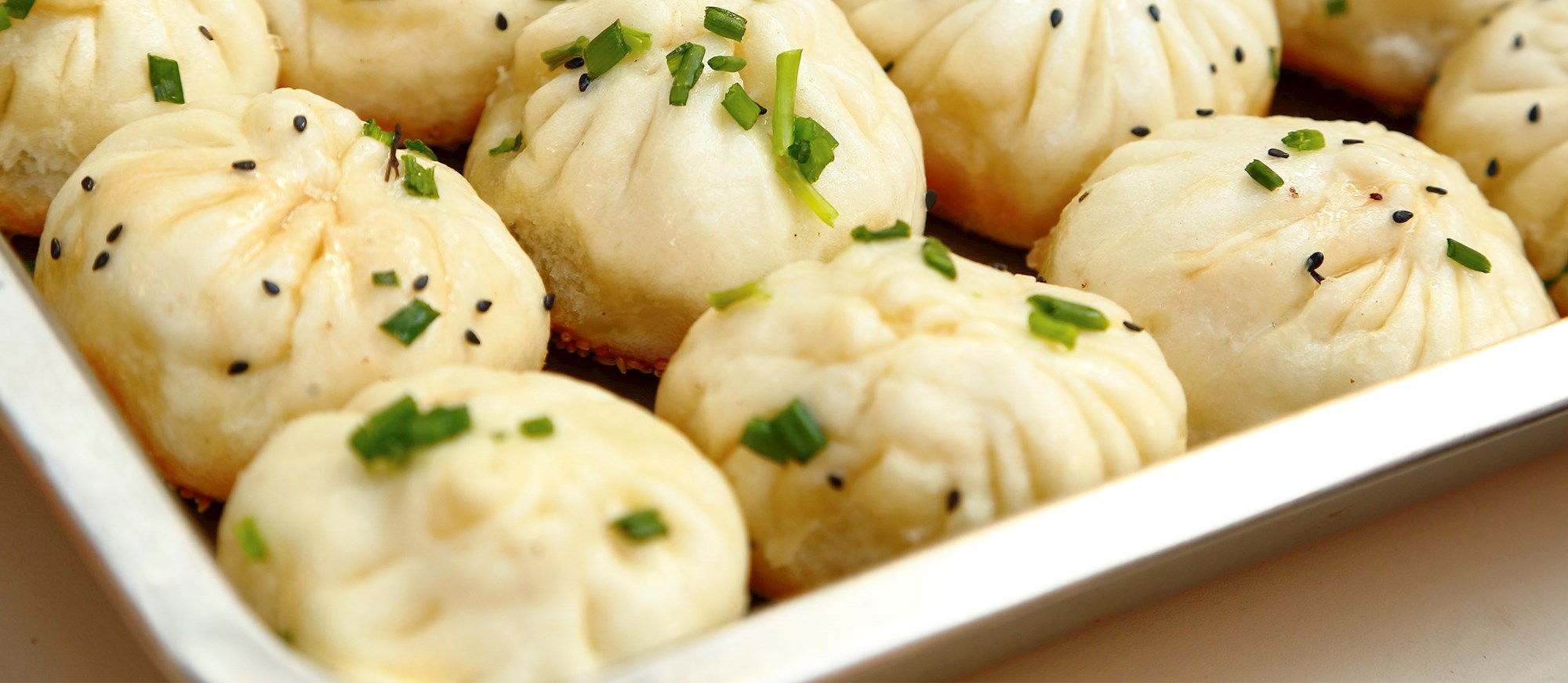 Where to Eat the Best Shengjian Mantou in the World? | TasteAtlas