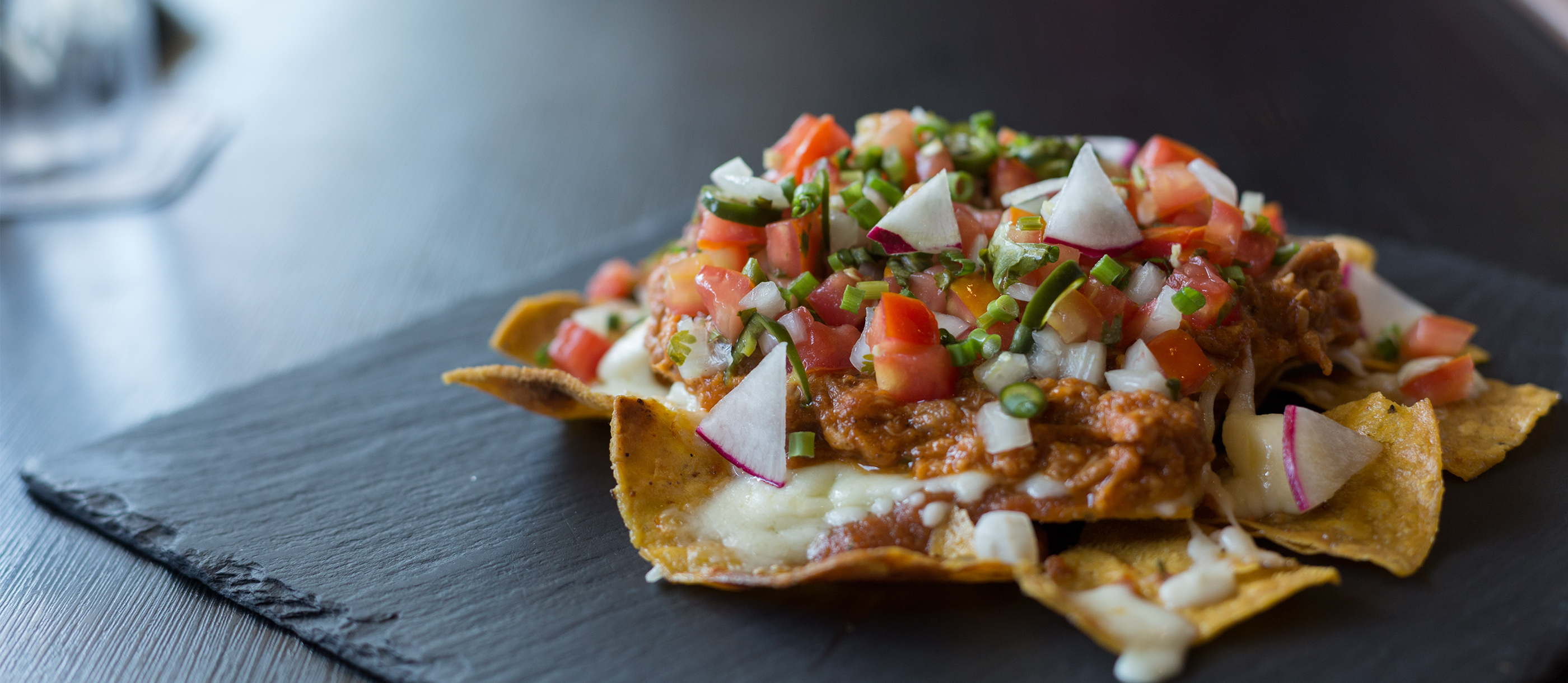 Pulled Pork Nachos | Traditional Appetizer From United States of America