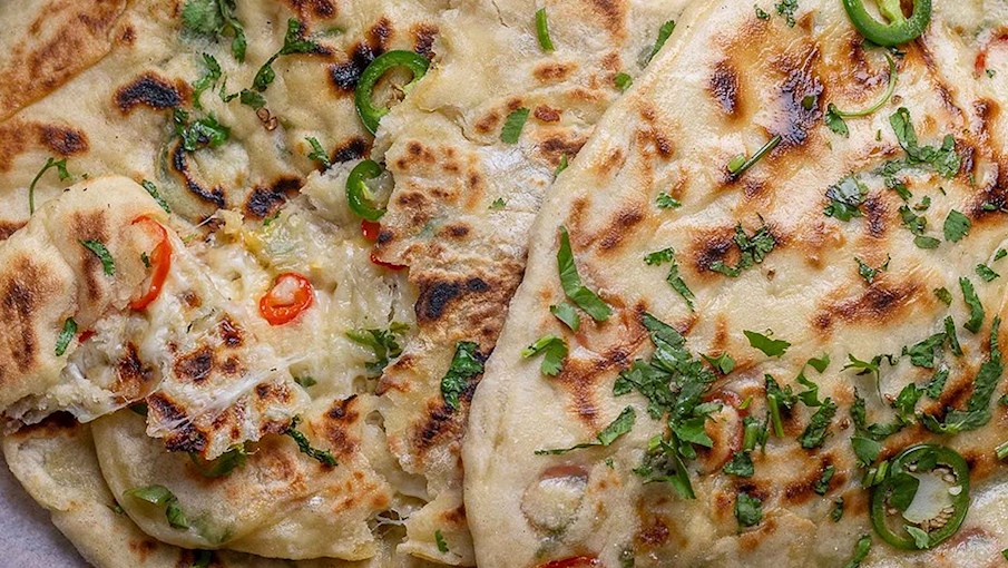 12 Naan Varieties Ranked From the Best To the Worst - TasteAtlas