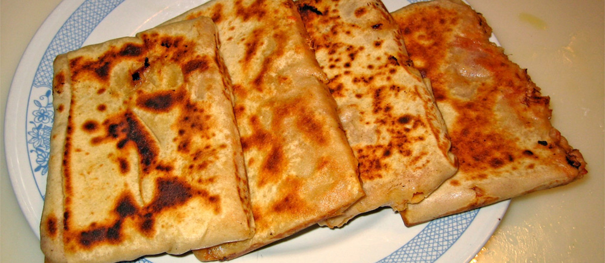 Where to Eat the Best Mahjouba in the World? | TasteAtlas