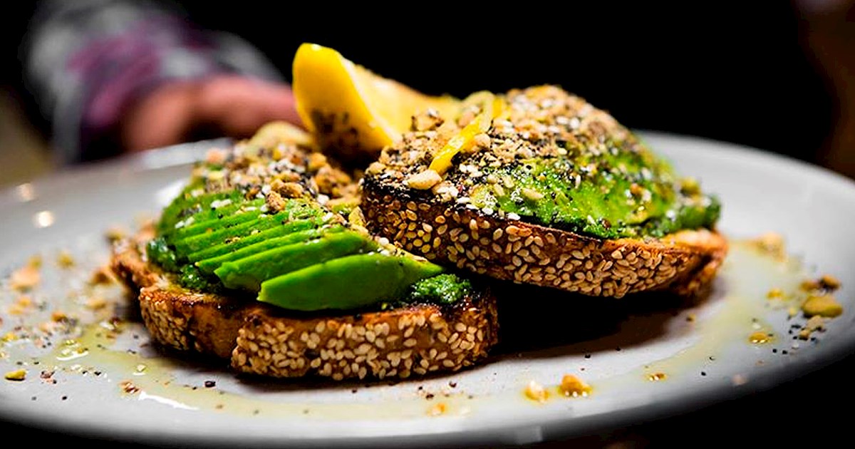 Avocado Toast In Code Black Coffee | TasteAtlas | Recommended authentic ...
