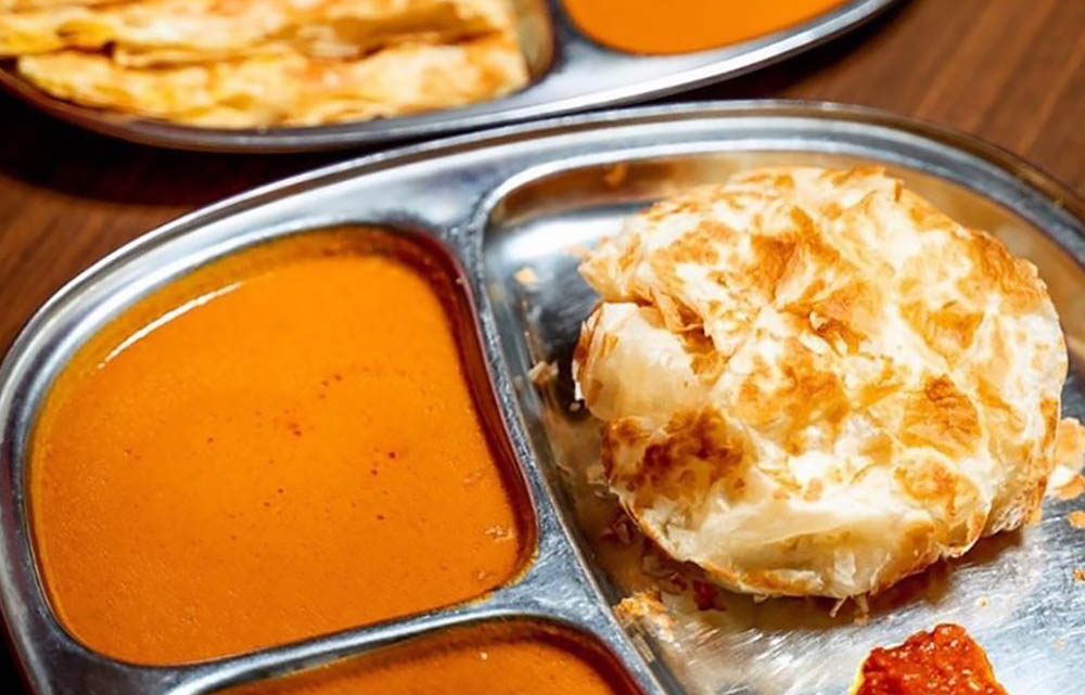 Roti Canai In Mamak Restaurant | TasteAtlas | Recommended authentic ...