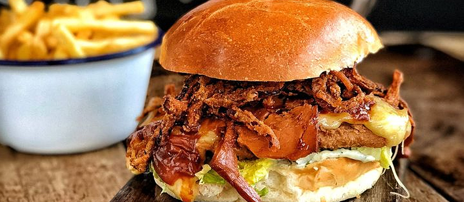 Burger In Three Brothers Burgers | TasteAtlas | Recommended authentic ...