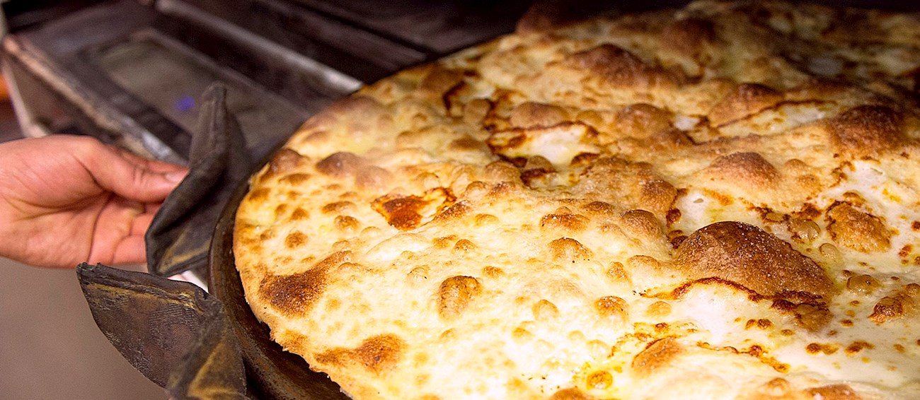 Focaccia di Recco Col Formaggio In Manuelina | TasteAtlas | Recommended ...