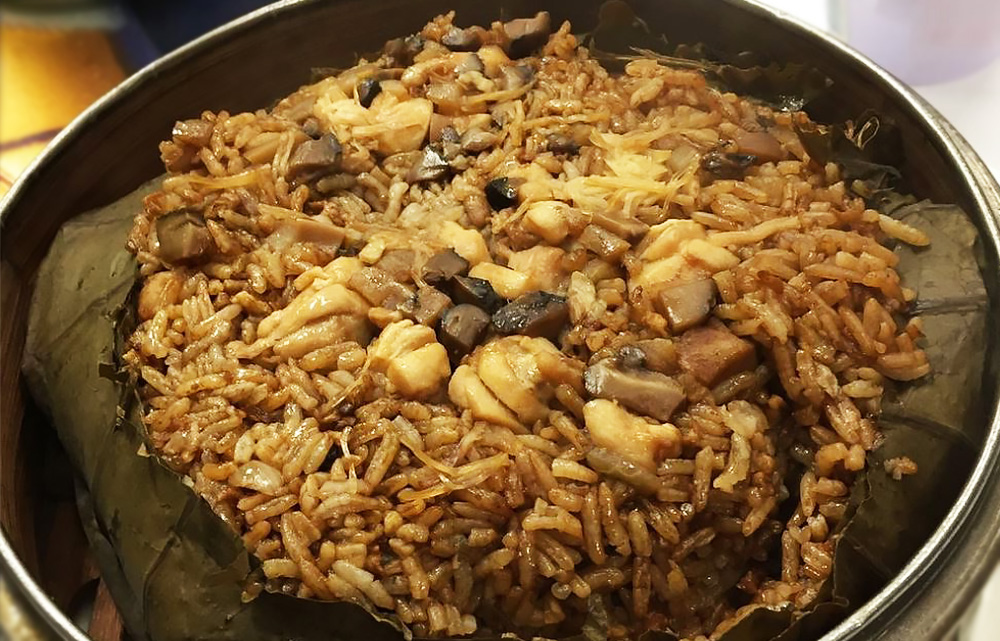 Lotus Leaf Rice In Tung Po | TasteAtlas | Recommended authentic restaurants