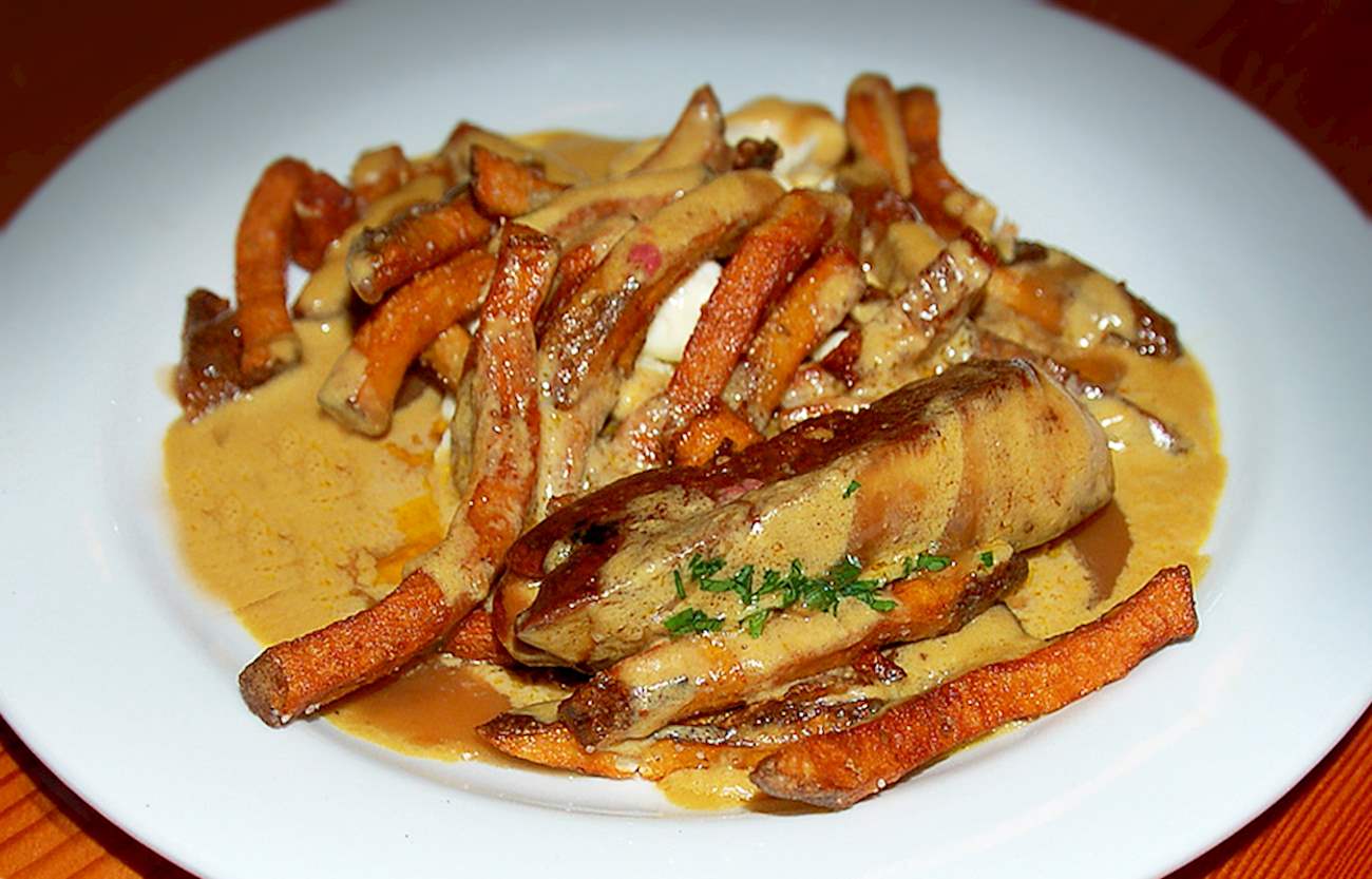 Poutine In Au Pied de Cochon | TasteAtlas | Recommended authentic ...