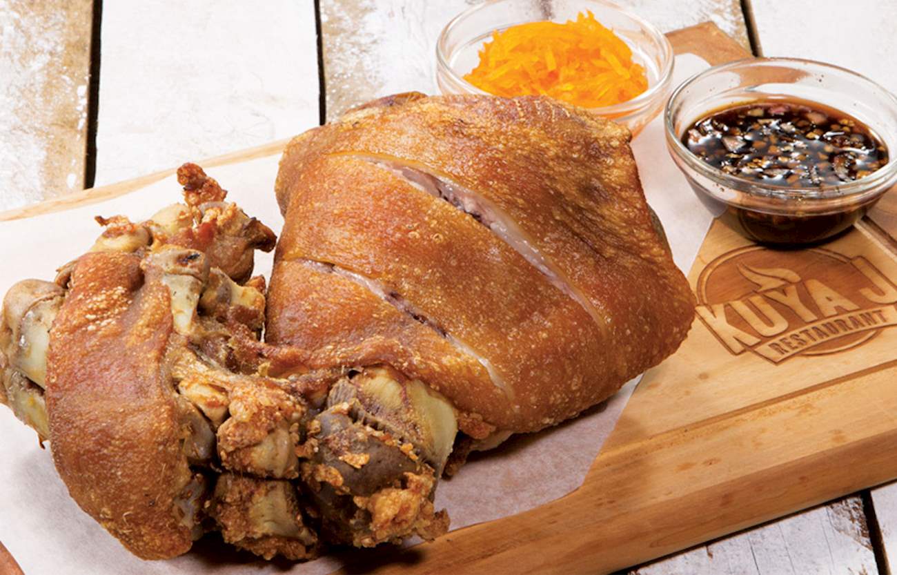 Crispy Pata In Kuya J Restaurant | TasteAtlas | Recommended authentic ...