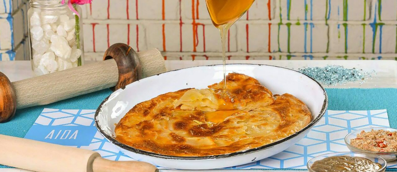 Where to Eat the Best Fetir Meshaltet in the World? | TasteAtlas