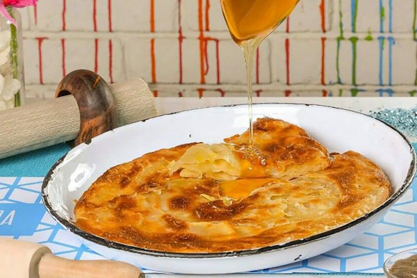 Where to Eat the Best Fetir Meshaltet in the World? | TasteAtlas