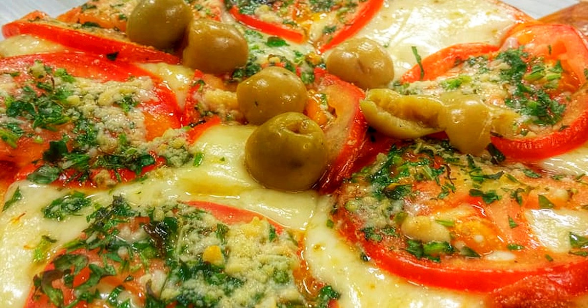 Pizza In El Cuartito | TasteAtlas | Recommended authentic restaurants