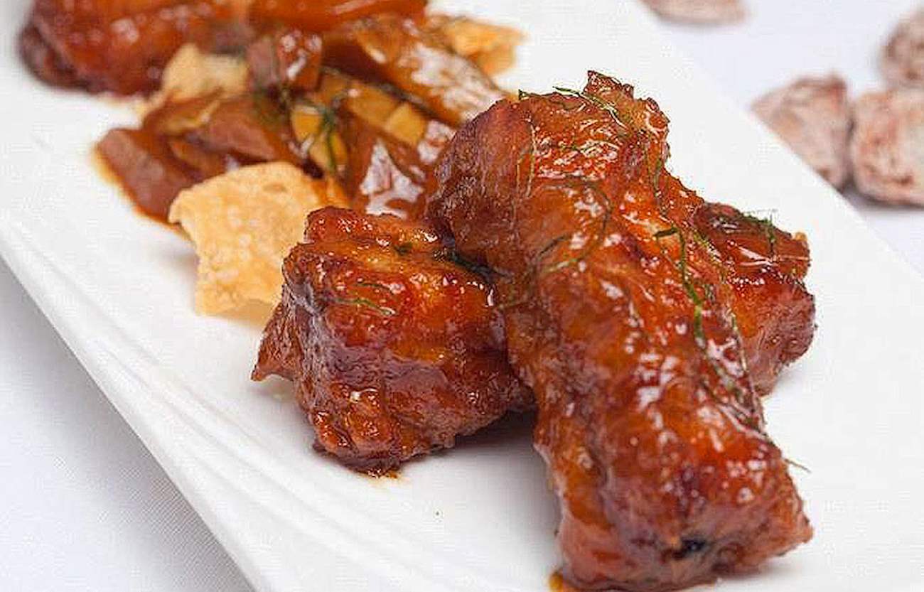 Sweet And Sour Spare Ribs In The Chairman | TasteAtlas | Recommended ...
