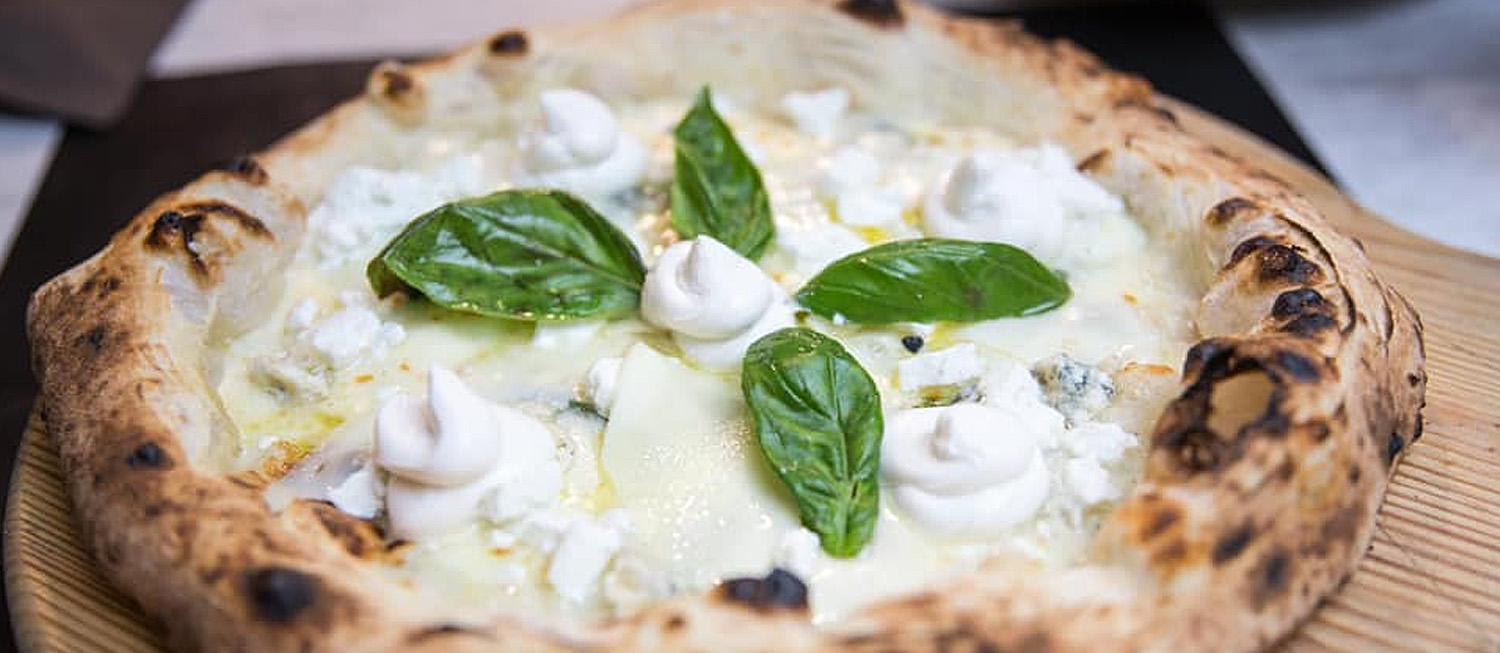 Pizza Quattro Formaggi | Traditional Pizza From Italy | TasteAtlas