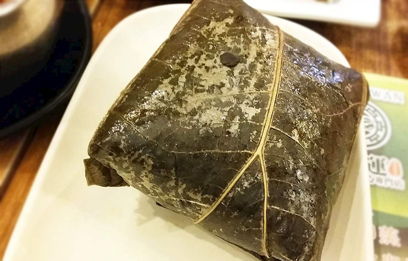 Lotus Leaf Rice In Tim Ho Wan | TasteAtlas | Recommended authentic ...